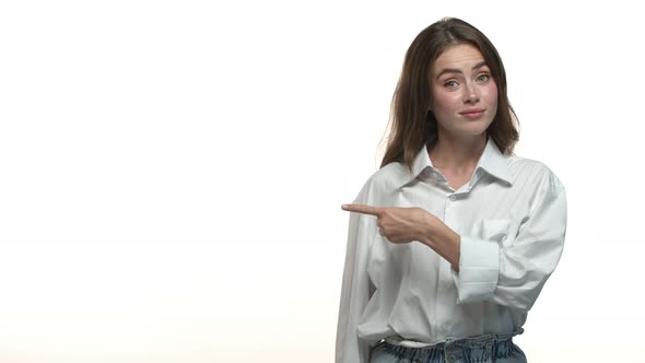 Indoor Shot of Attractive Caucasian Female Model in White Shirt Nod in ...
