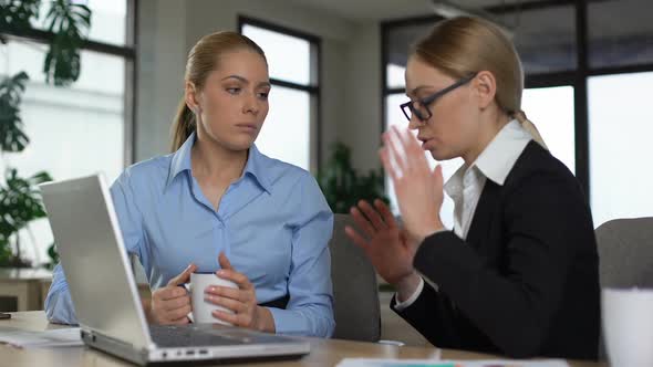 Female Coworkers Chatting, Having Coffee Break in Office, Complaining ...