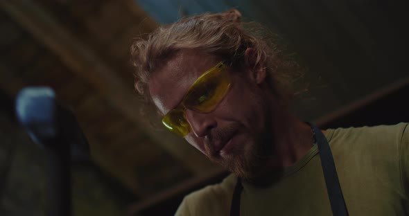 Portrait of Scandinavian or Slavic Blacksmith Working By Hammer in ...
