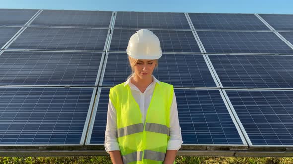 Female Ecological Engineer with a Roll of Paper Where There are ...