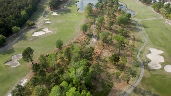 Aerial over Magnolia Greens golf course slow orbiting parallax, Stock ...