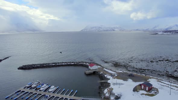 Ariel orbiting shot of the Ase Harbor Norway with stunning views of ...