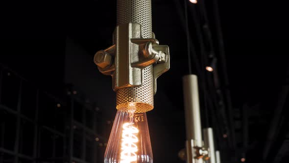 Stylish metal lamp, row of decorative light bulb, modern, industrial ...