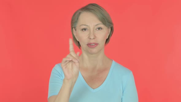 Rejecting Old Woman in Denial on Red Background, Stock Footage | VideoHive