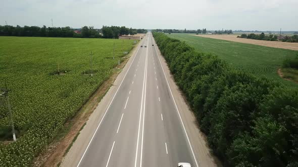 Aerial Fly Over Motorway, Freeway Traffic - Trucks and Cars on the Road ...