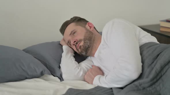 Man Awake in Bed Thinking, Stock Footage | VideoHive