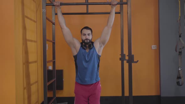 Workout of Handsome Young Middle Eastern Man in Gym. Strong Bearded ...