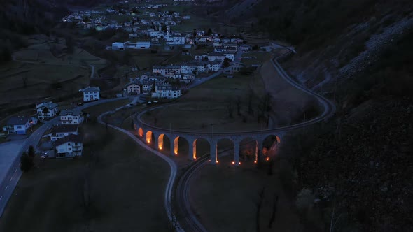 Illuminated Brusio Spiral Viaduct in Switzerland, Stock Footage | VideoHive