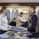 Female Sales Assistant Working at Menswear Boutique, Stock Footage