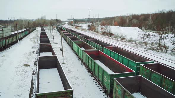 Empty shipping containers are located at an abandoned railway station ...