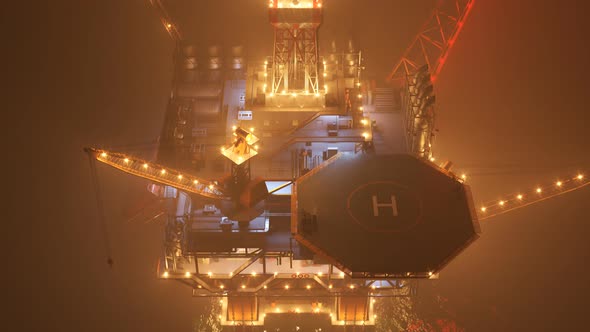 Oil rig on an open ocean during a foggy night - 4k., Motion Graphics