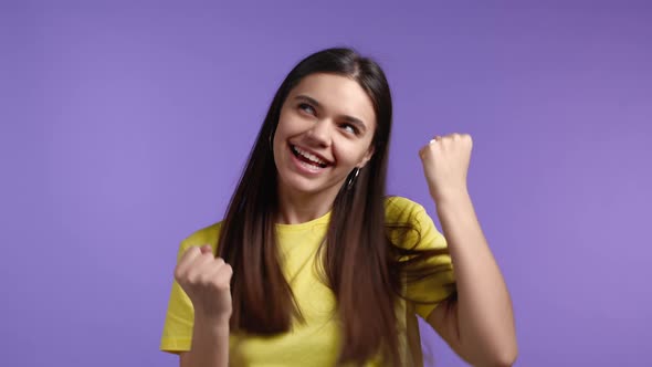 Woman is Very Glad and Happy She Shows Yes Gesture of Victory She ...