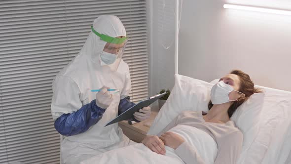 Doctor Interviewing Patient in Hospital Room, Stock Footage | VideoHive