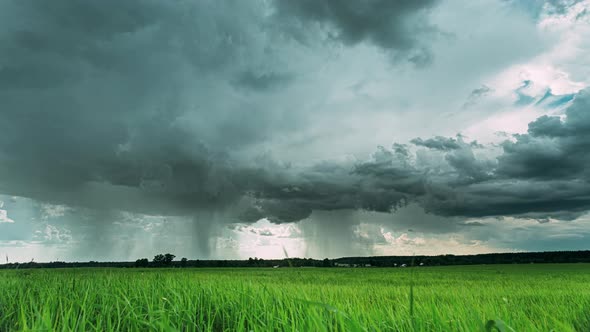 Rain Rainy Clouds Above Countryside Rural Field Landscape With Young ...