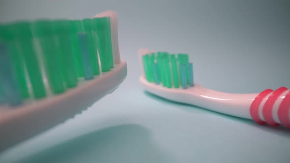 Extreme Macro Video Filming Toothbrush on a Blue Background in Motion ...