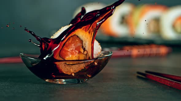 Super Slow Motion Shot of Fresh Sushi Falling Into Soy Sauce at 1000Fps ...