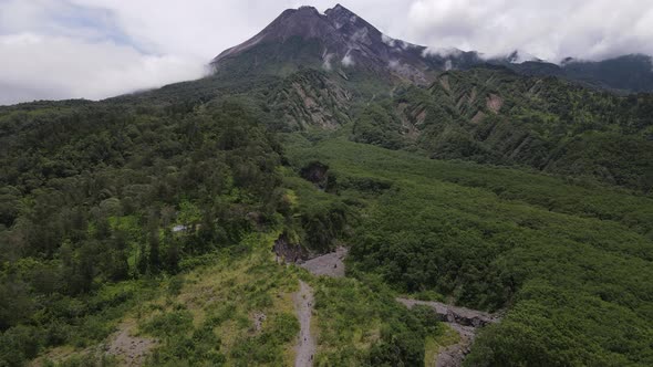Aerial view of active Merapi mountain with clear sky in Indonesia ...