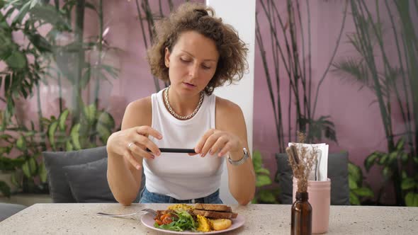 Female Food Blogger Taking Pictures of Her Healthy Meal to Share on ...