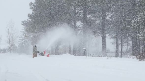 Man Using Snowblower in a Blizzard Wide, Stock Footage | VideoHive