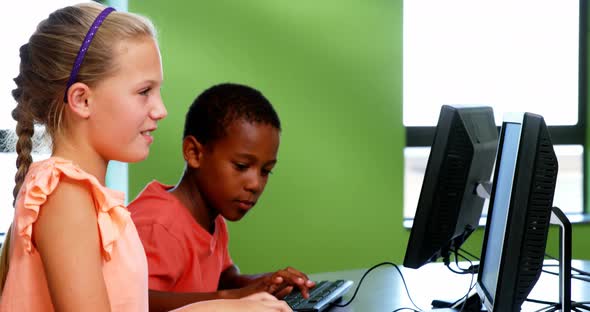 School kids using computer in classroom, Stock Footage | VideoHive