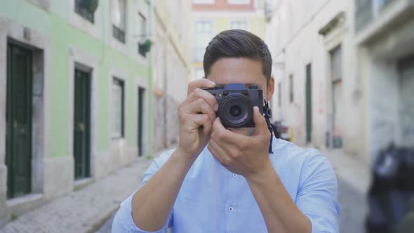 Front View of Male Photographer with Digital Camera Outdoor, Stock Footage
