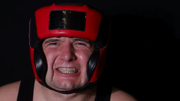 Angry Male Boxer on a Black Background, Stock Footage | VideoHive