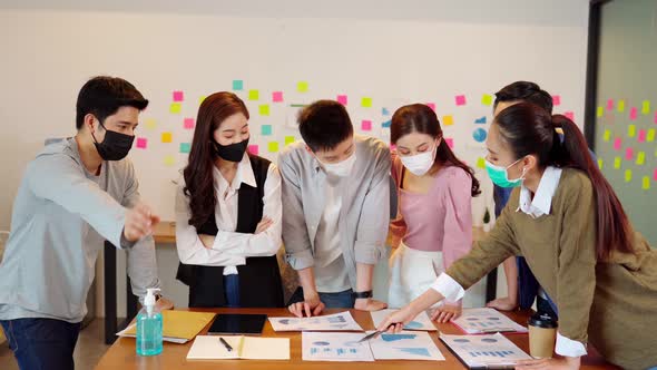 New normal group of Business man and woman wearing face mask meeting ...