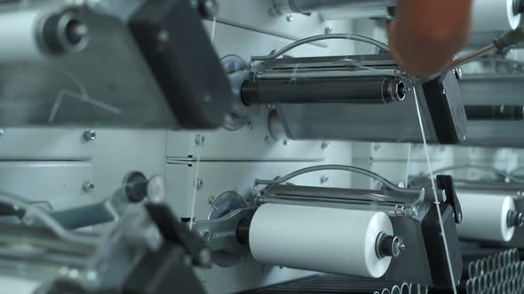 Operator Works on Polymer Thread Winding Machine, Stock Footage | VideoHive