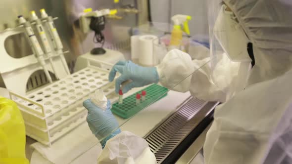 Arcing Around A Scientist In Hazmat Suit, Stock Footage | VideoHive