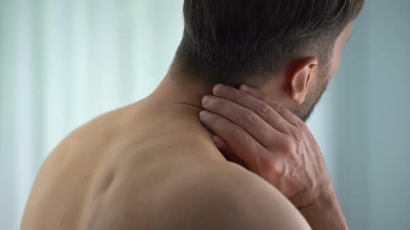 Male Touching Neck, Feeling Strong Spasm Upper Back, Pinched Nerve ...