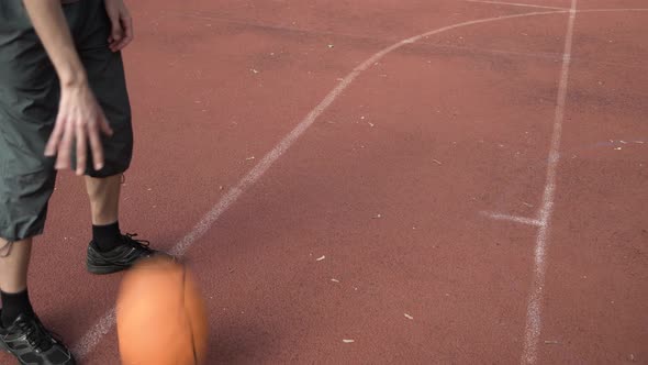 Amateur Basketball Player Practicing Ball Handling and Scoring Skill ...