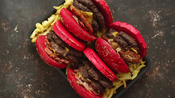 A Set of Red Bun Homemade Delicious Burgers of Beef, Bacon, Cheese ...