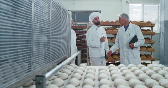 Baker Chef and His Two Assistance Showing the, Stock Footage | VideoHive