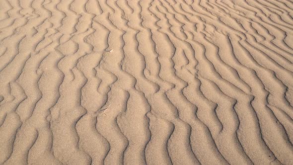 Parallel Sand Pattern Lines on Dune Surface in Desert, Stock Footage