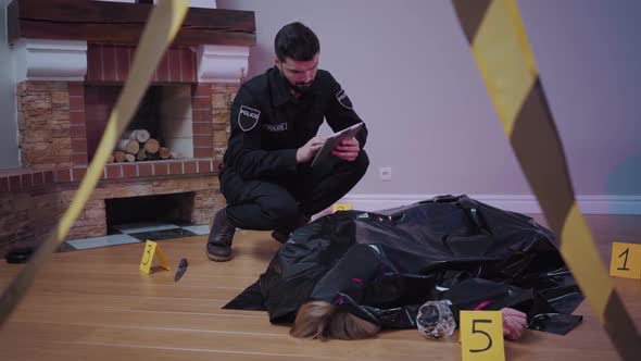 Portrait of Caucasian Detective Looking Around Covered Body of Female ...