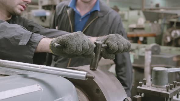 Engineer man training with foreman for apprentice using lathe ...