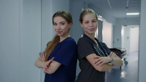 Successful Interns Stand in the Hospital Corridor and Look at the ...