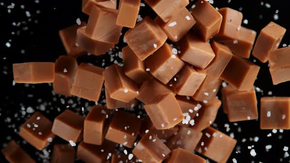 Super Slow Motion Shot of Salted Caramel Explosion Towards Camera ...