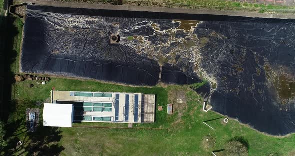 aerial video of wastewater treatment plant, residential retention ...
