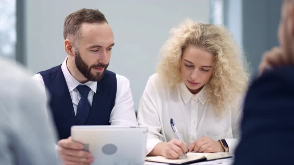 Smiling Busy Female Writing Text in Notepad Using Pen From Dictating of ...