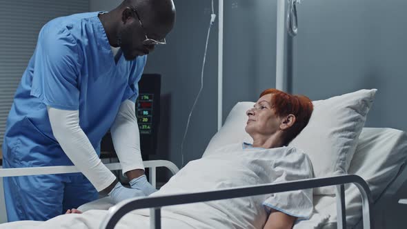 Nurse Putting IV on Patient, Stock Footage | VideoHive