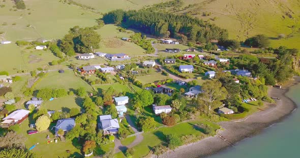 Birdseye aerial pull-out view over Port Levy, once the largest Maori ...