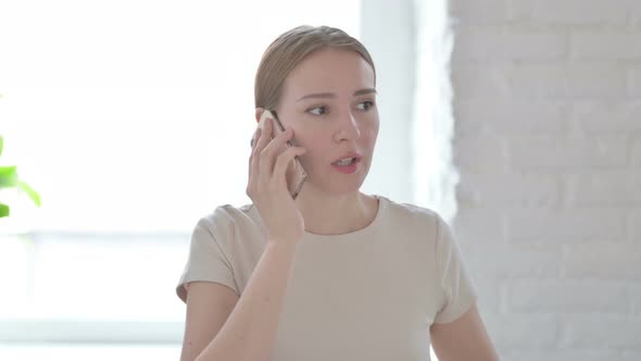Displeased Woman Talking Angrily on Smartphone, Stock Footage | VideoHive