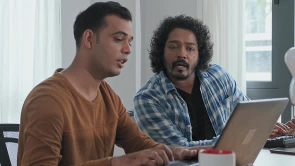 Two Programmers Talking while Working on Computers, Stock Footage ...