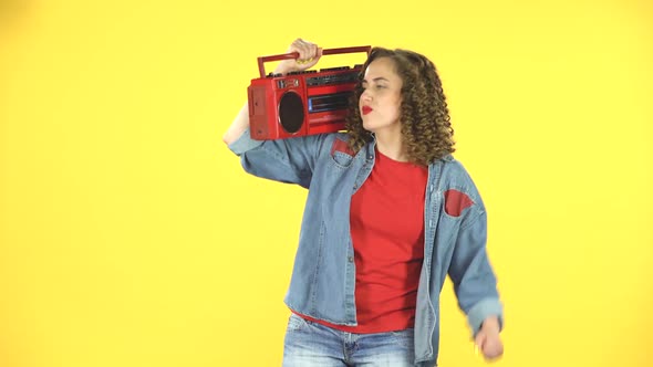 Girl Enters, Puts a Red Boombox on Her Shoulder and Starts Dancing, 80s ...