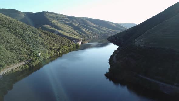 Gorgeous aerial reveal of the Douro River viewed through a soft lens ...
