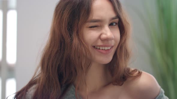 Portrait Attractive Woman Winking Eye and Smiling Into Camera, Stock ...