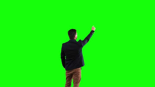 Caucasian man in a green background, Stock Footage | VideoHive