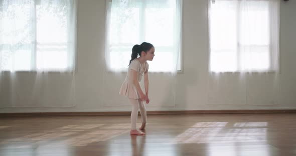 Little girl dancing alone in a studio, Stock Footage | VideoHive
