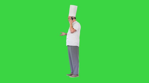 Male Chef Cook with Calling on Smartphone on a Green Screen Chroma Key ...